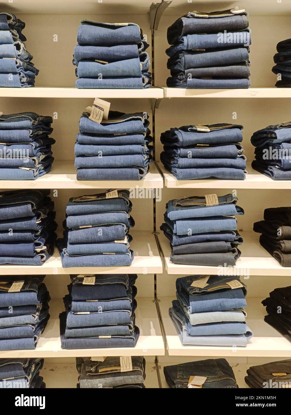 Indian men's latest fashion dress hung on hangers, in a retail store in ...