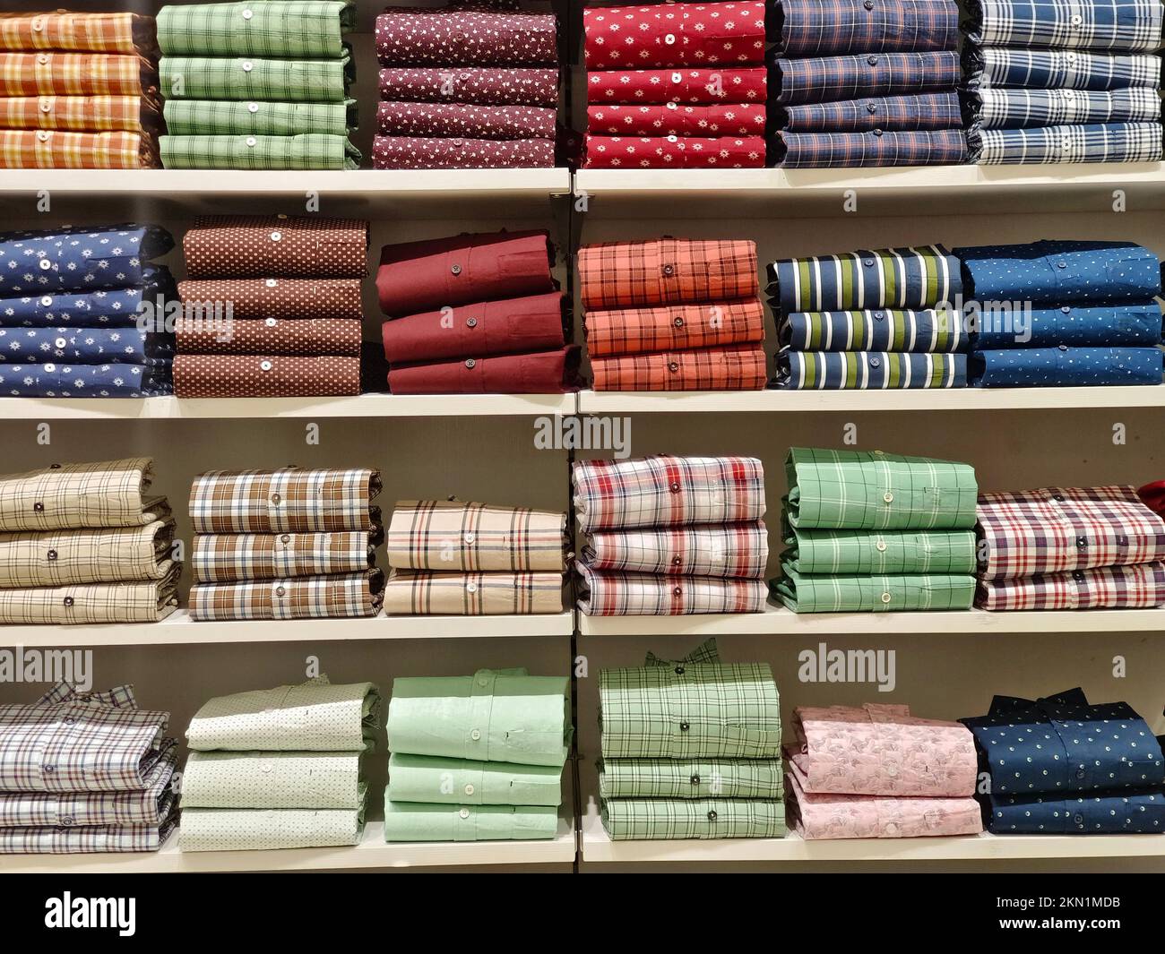 Indian men's latest fashion dress hung on hangers, in a retail store in ...