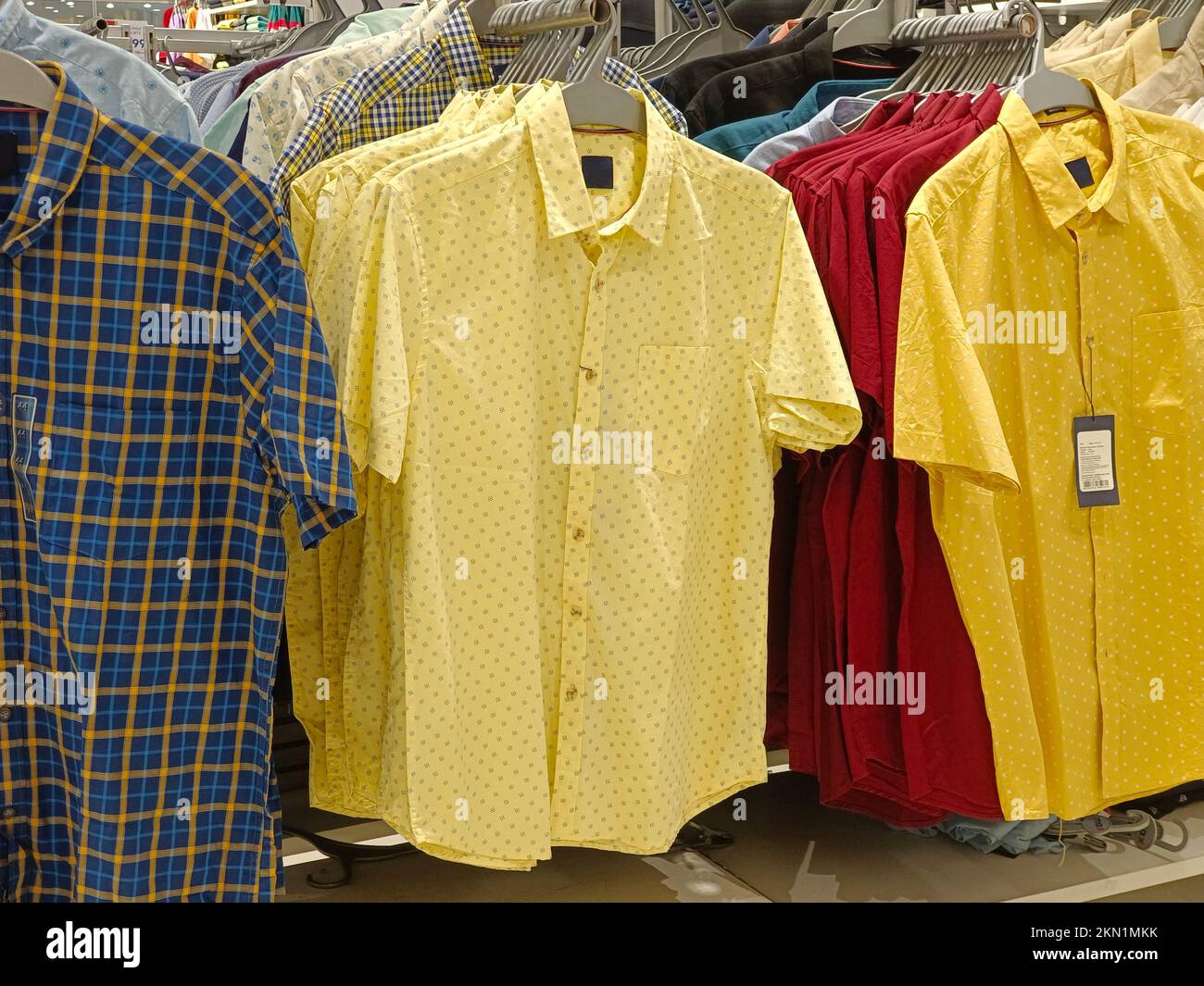 Indian men's latest fashion dress hung on hangers, in a retail store in ...