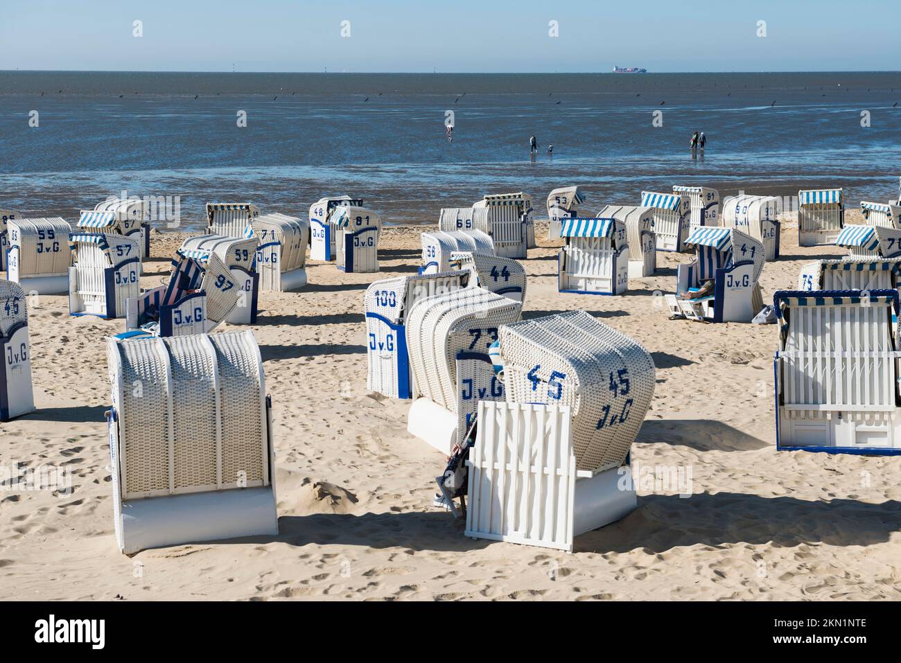 White beach chairs and mudflats, Duhnen, Cuxhaven, North Sea, Lower ...