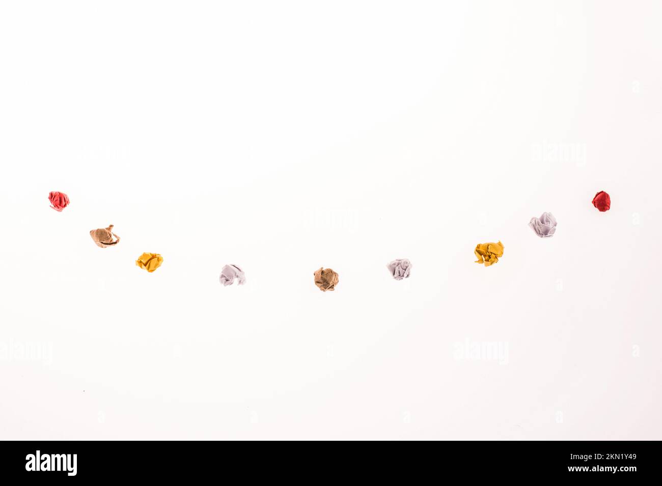 Colorful crumpled papers form smile on white background Stock Photo - Alamy