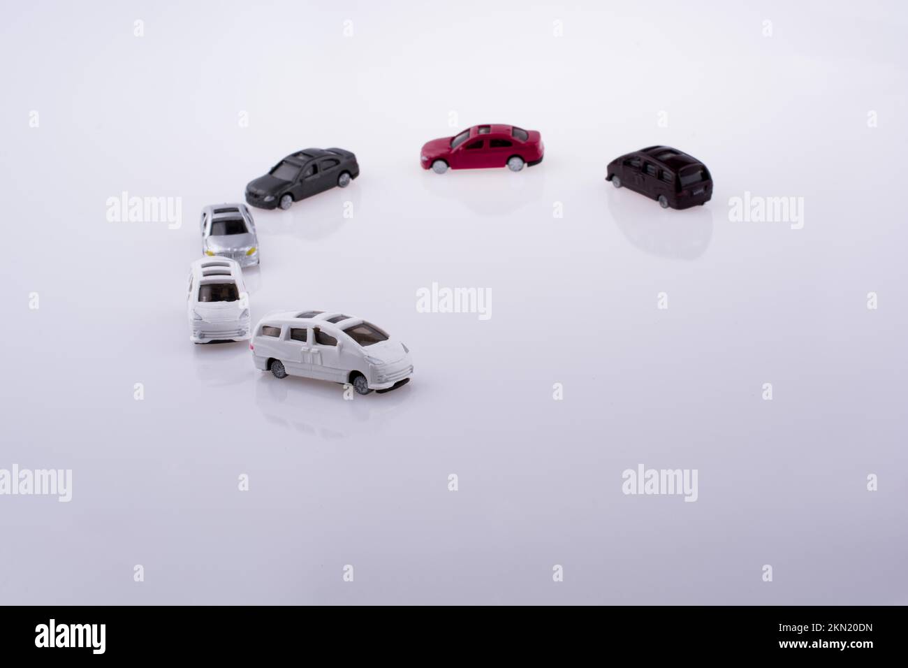 Colorful little toy cars on white background Stock Photo - Alamy