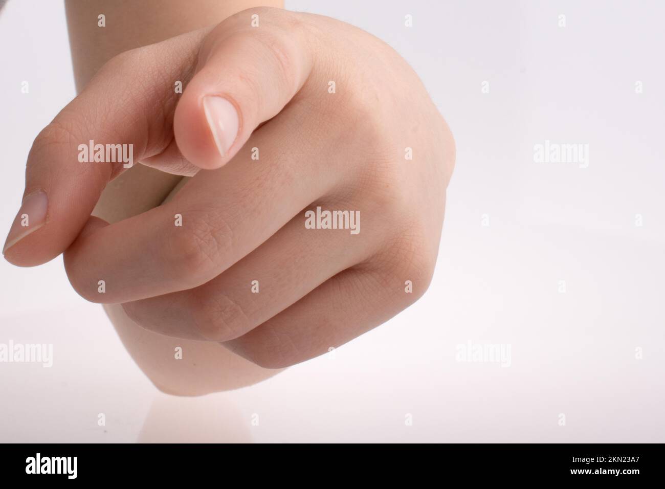 Hand pointing gesture on a white background Stock Photo - Alamy