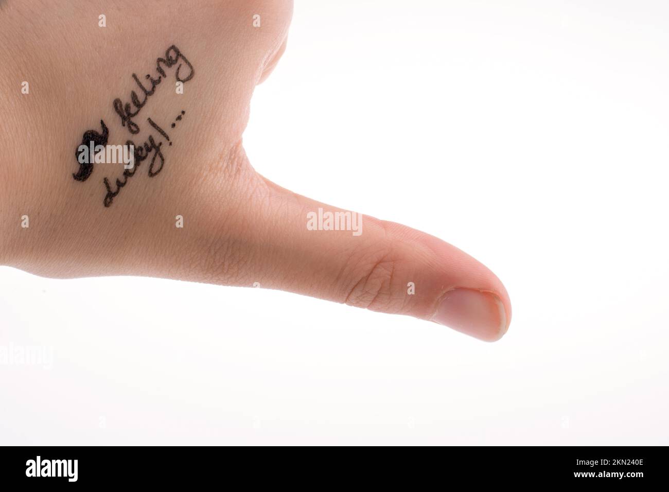 Moustache design on a hand in a white background Stock Photo - Alamy