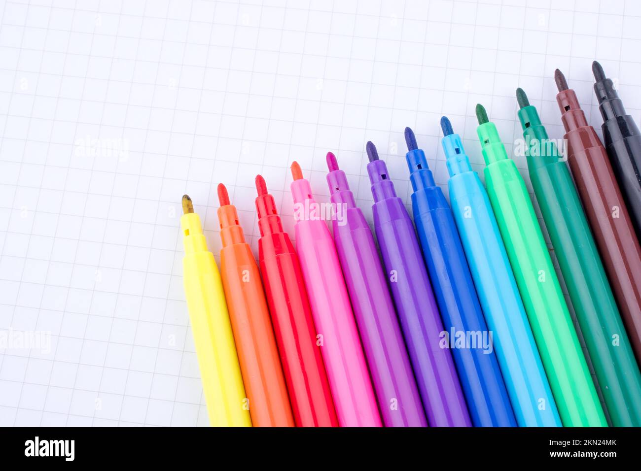 Colorful felt-tip pens on a notebook Stock Photo - Alamy