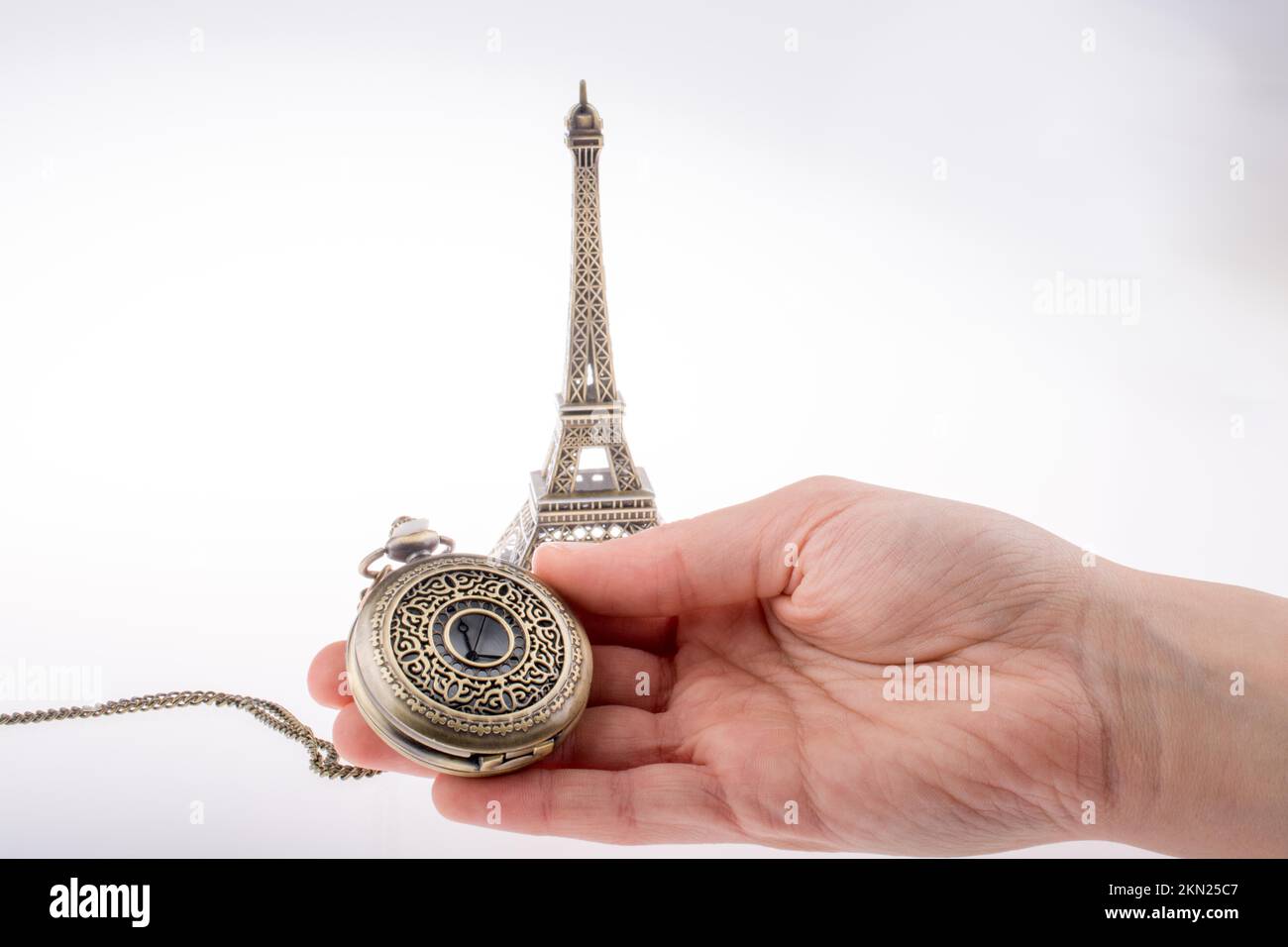Hand holding pocket watch hi-res stock photography and images - Alamy