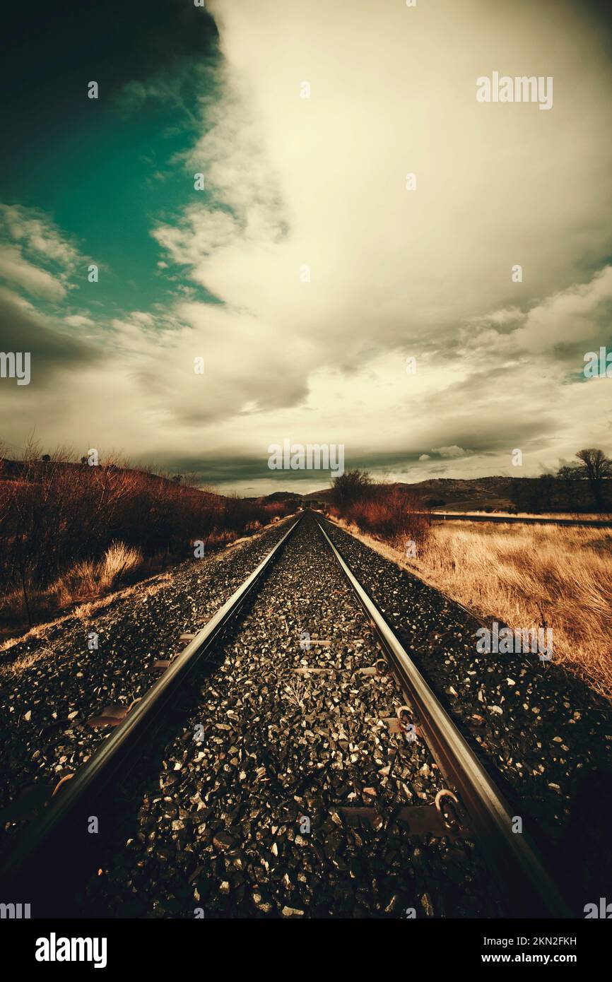 Vintage railroad lines hauling off into the distance of an old ...