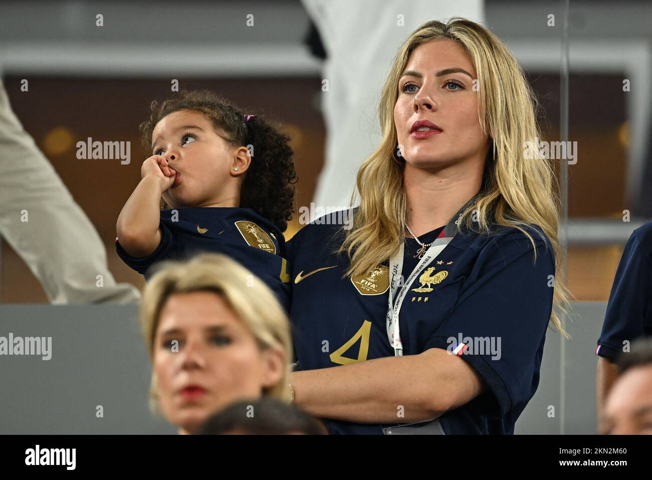 Wife of Raphaël Varane Camille Tytgat and their daughter during France ...