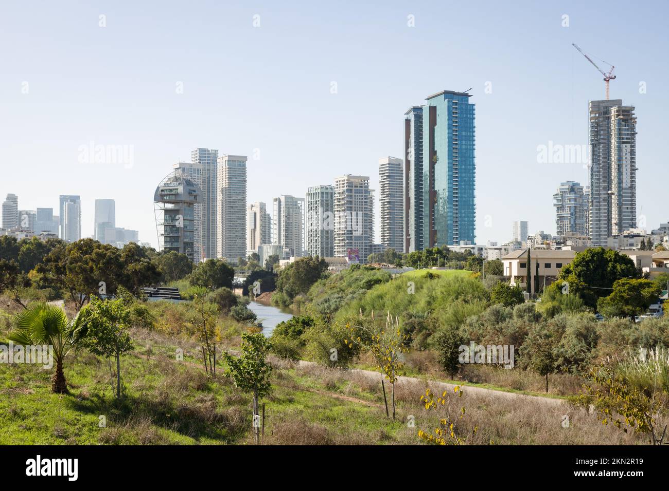 city park with towers at the background, Tel Aviv, Israel Stock Photo ...