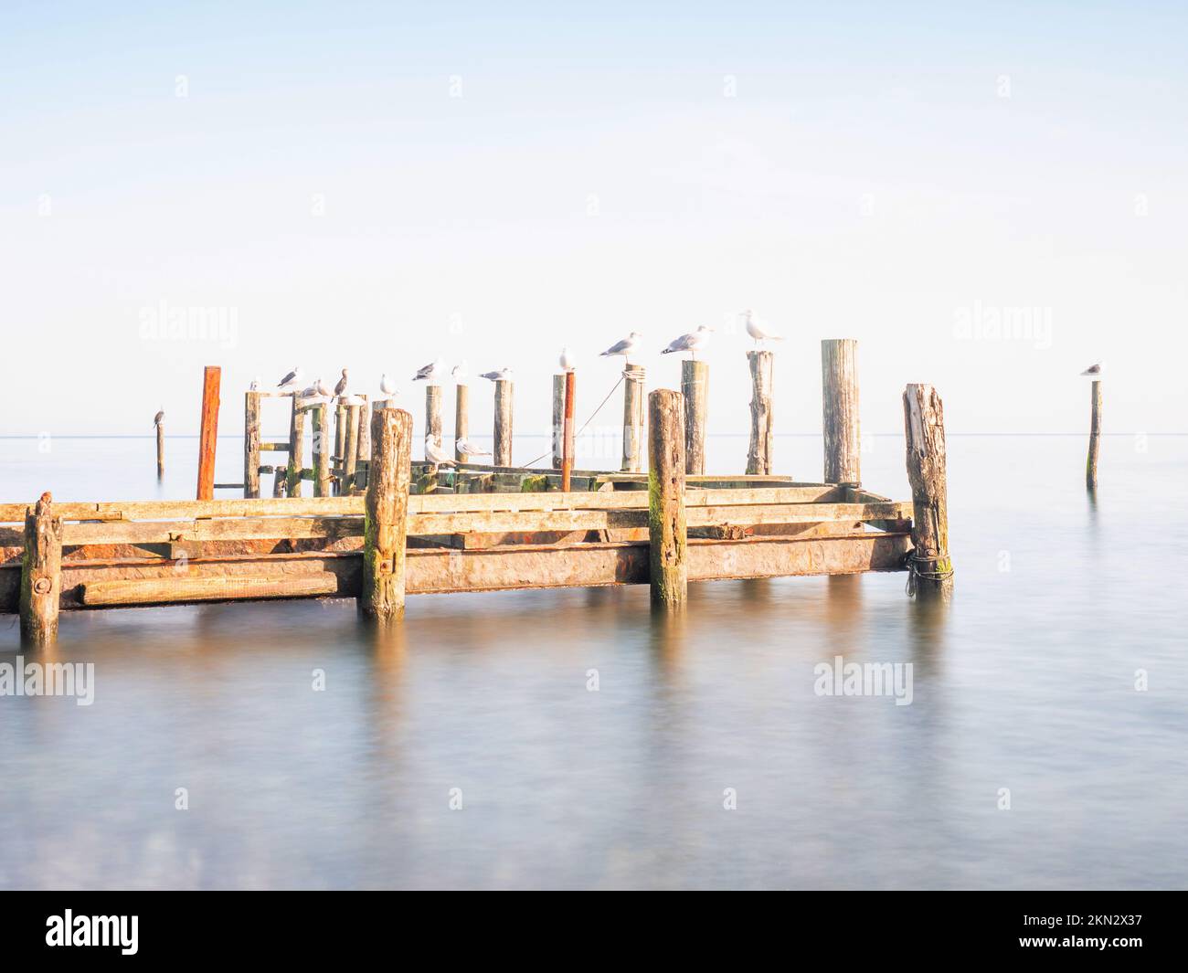 The rest of pillars and poles of port mole in fishing Village of Vitt ...