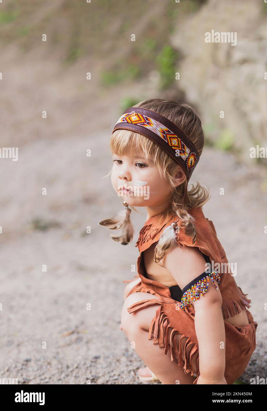 Cute baby dressed in traditional Native Americanс costume Stock Photo ...