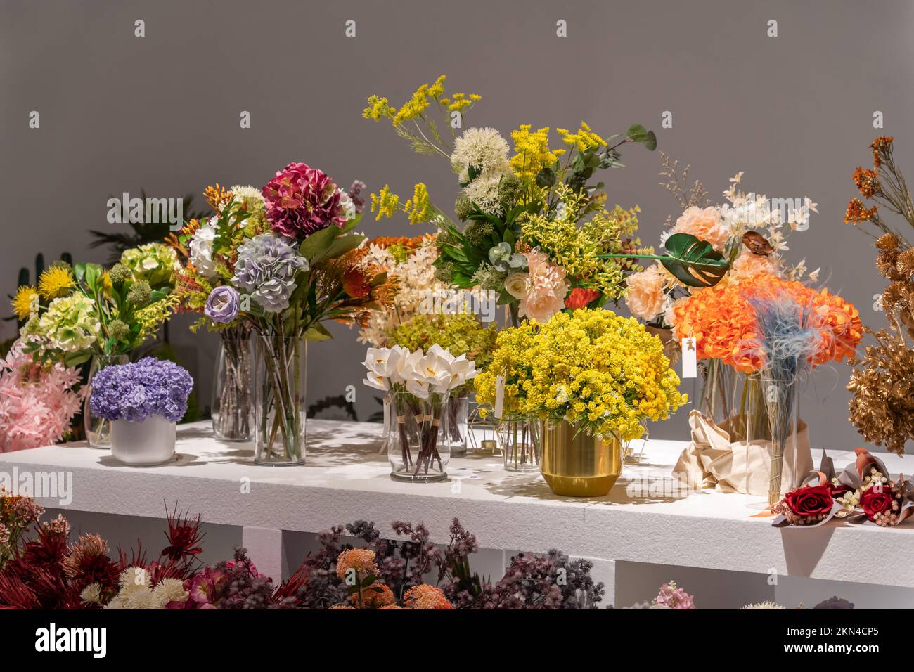 Beautiful showcase of flower shop with large assortment of artificial ...