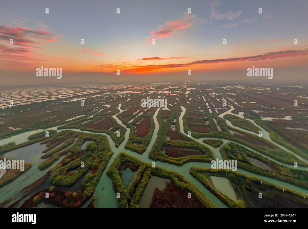 SUQIAN, CHINA - NOVEMBE 25, 2022 - Aerial photo shows the winding reed ...