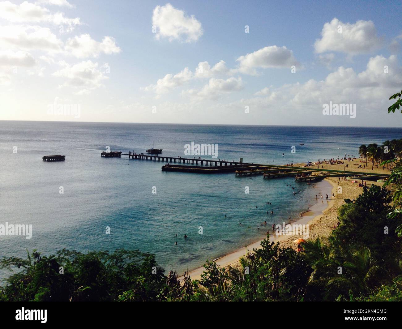 A beautiful sandy beach under a blue cloudy sky on a sunny day in ...