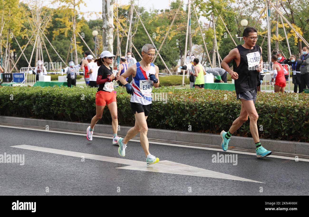 SHANGHAI, CHINA - NOVEMBER 27, 2022 - Runners take part in the 2022 ...