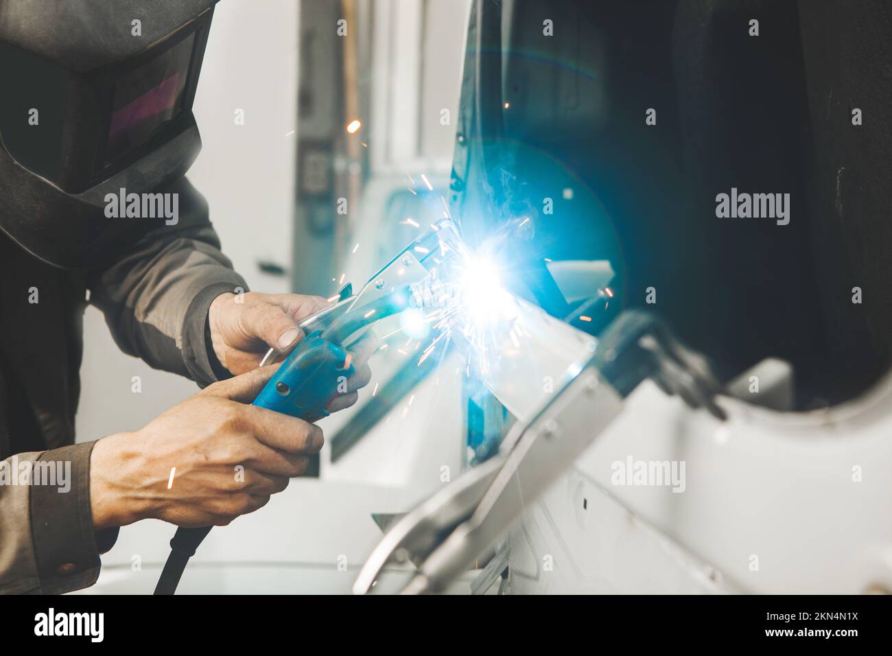 Man in protective mask welds hi-res stock photography and images - Alamy