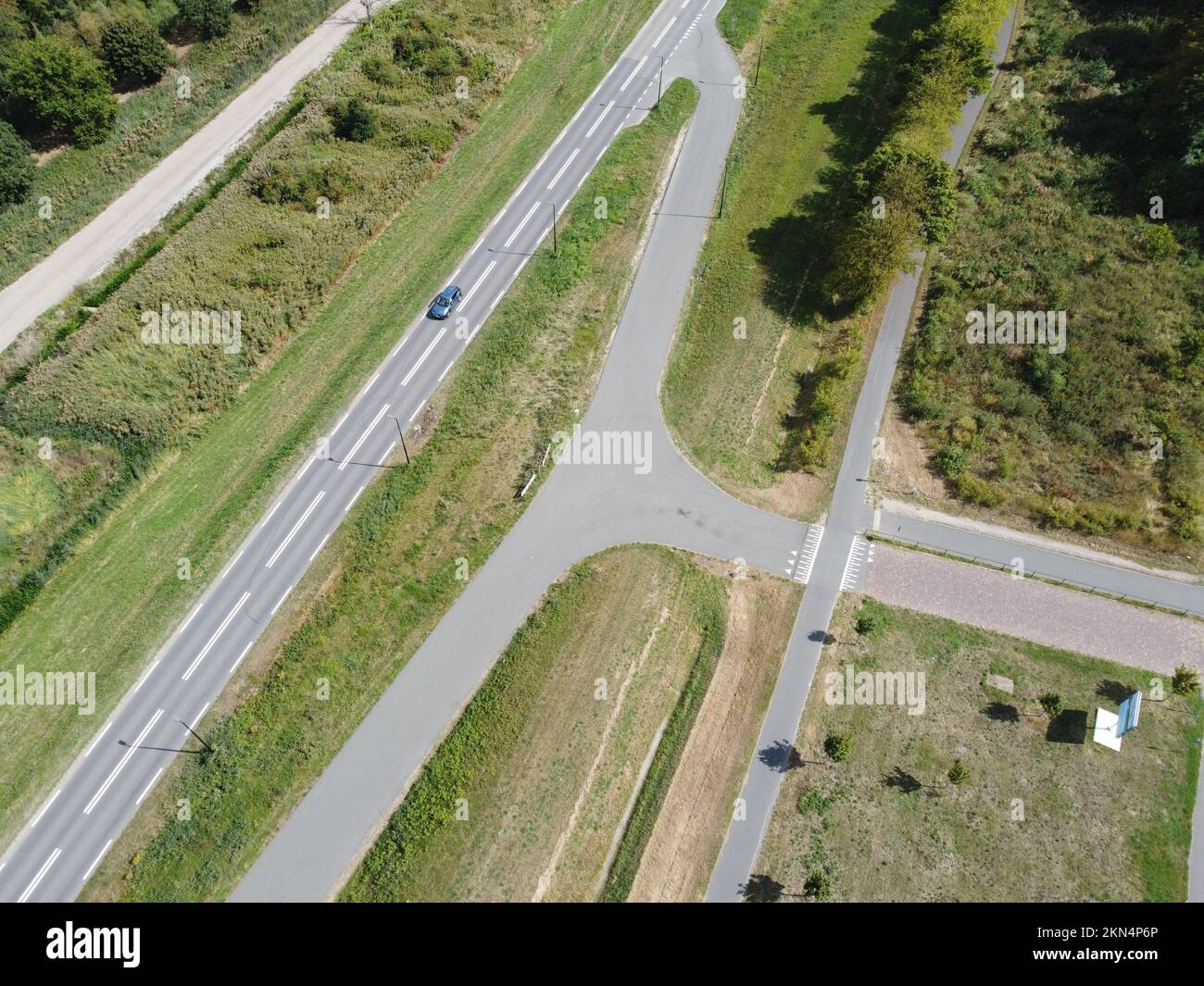 An aerial view of roads and agricultural fields in a rural area in the ...