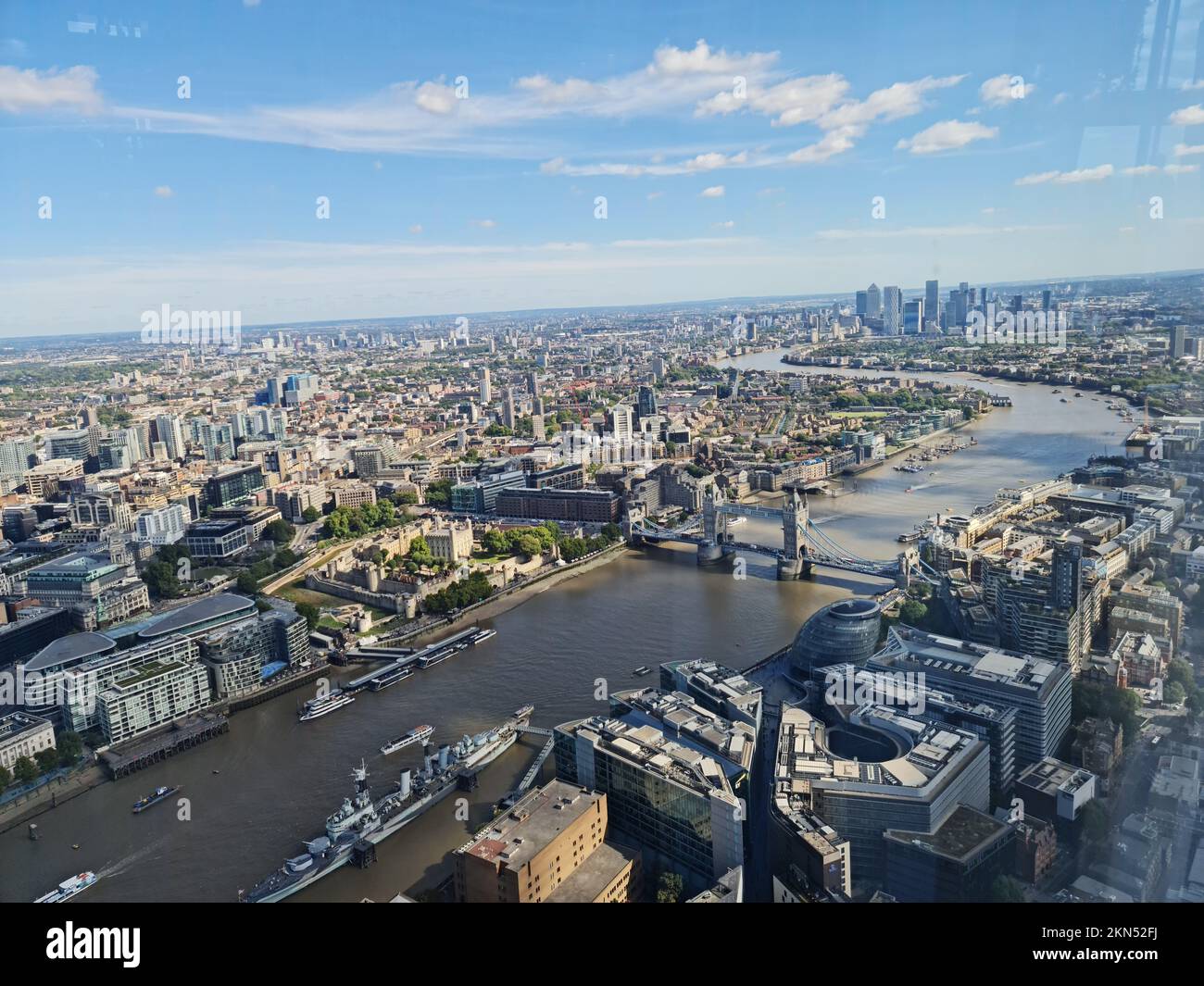 An aerial view of the River Thames with Tower bridge in London, England ...