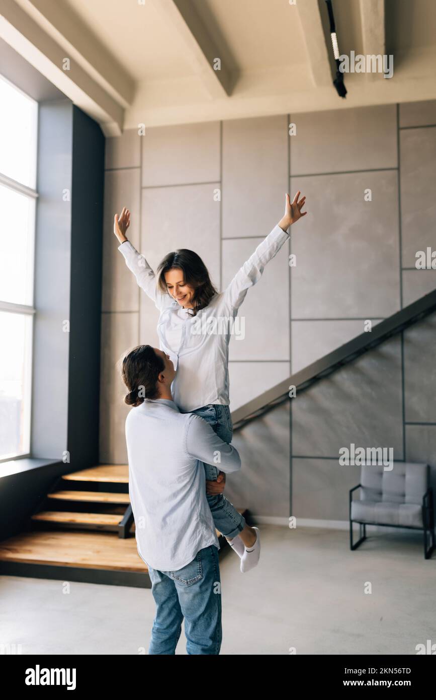 Closest friends and lovers. Young passionate couple having fun together ...