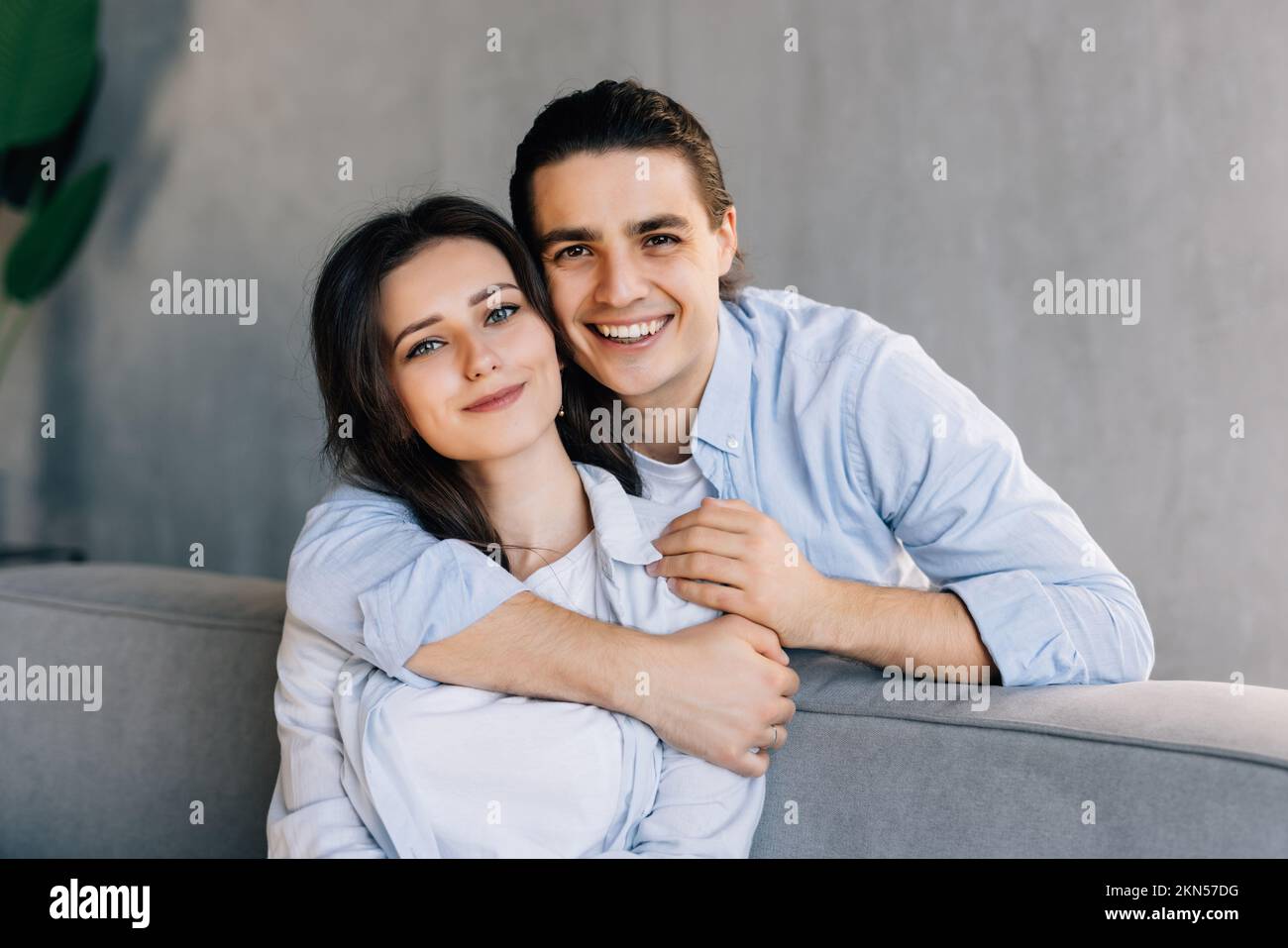 Loving husband comfort upset offended wife, caressing and hugging her ...
