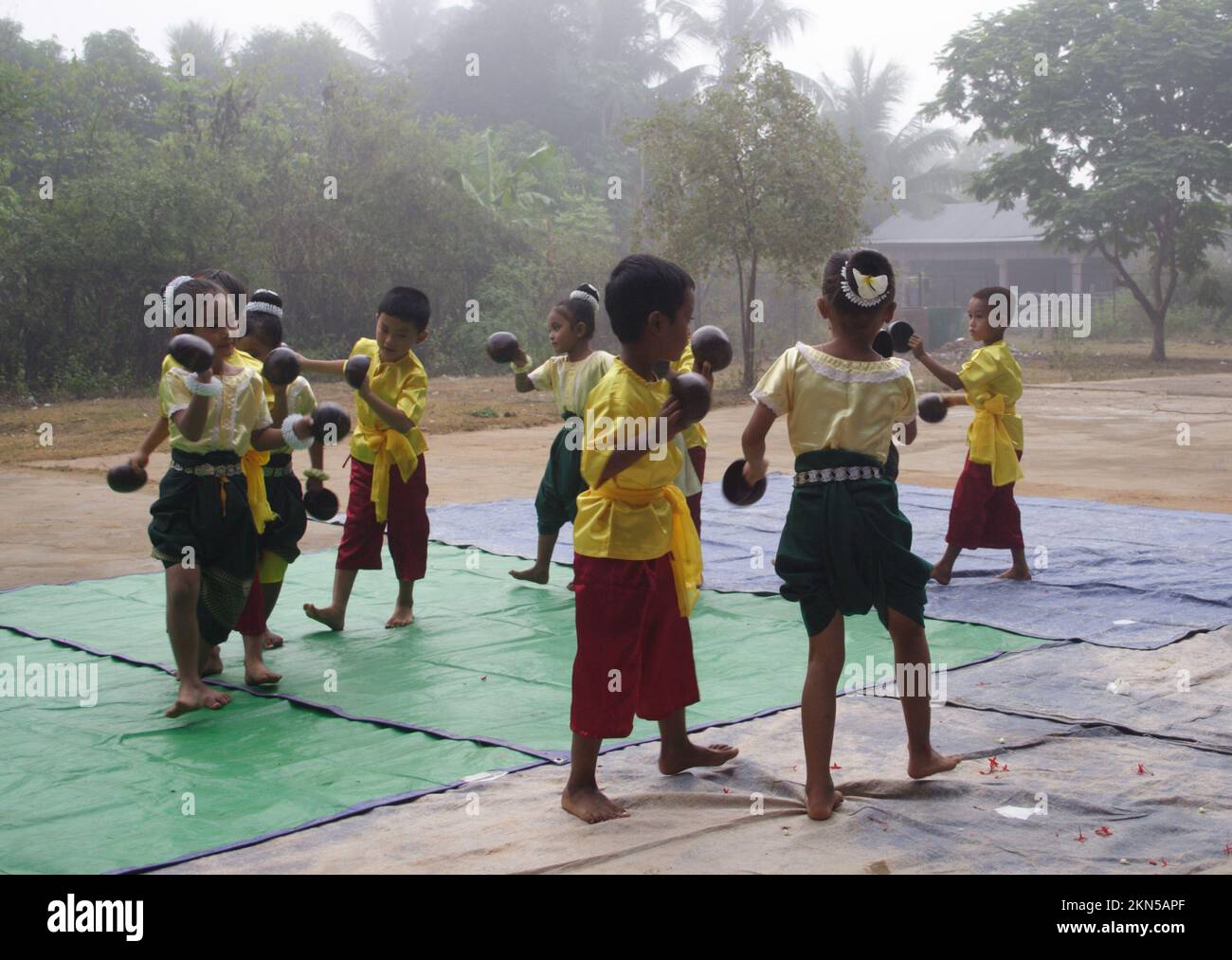 Children doing the coconut shell dance, Vat Luong, Pursat Province ...