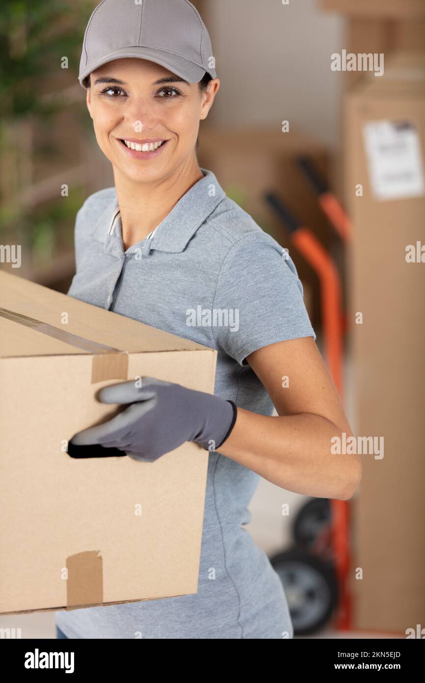 Woman wearing cap carrying hi-res stock photography and images - Alamy