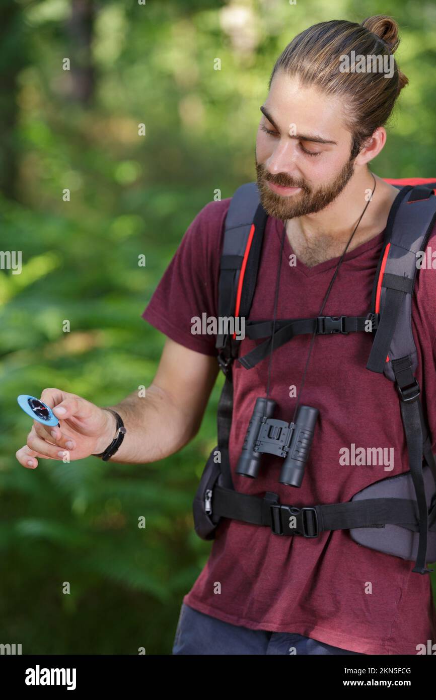 man with compass in hand Stock Photo - Alamy