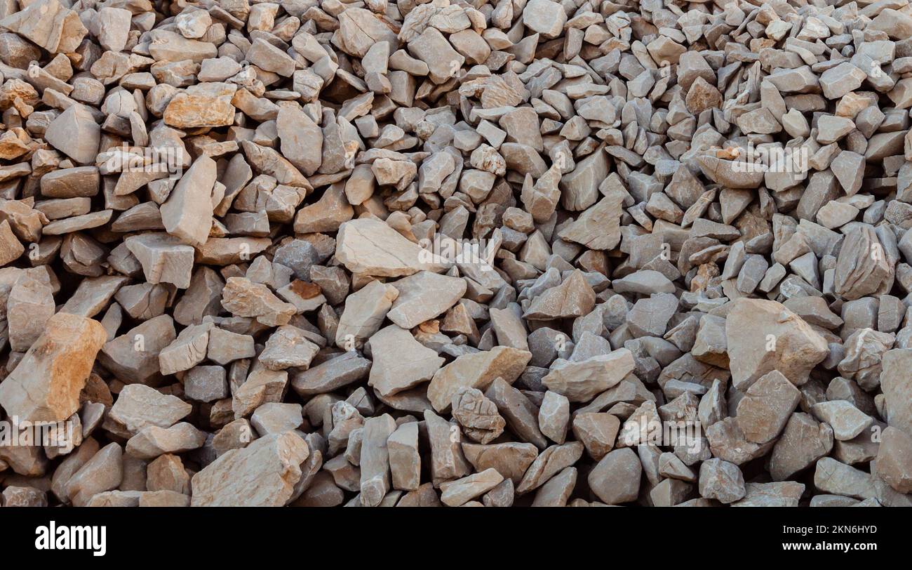 Background of small gray stones. Pile of stones Stock Photo - Alamy