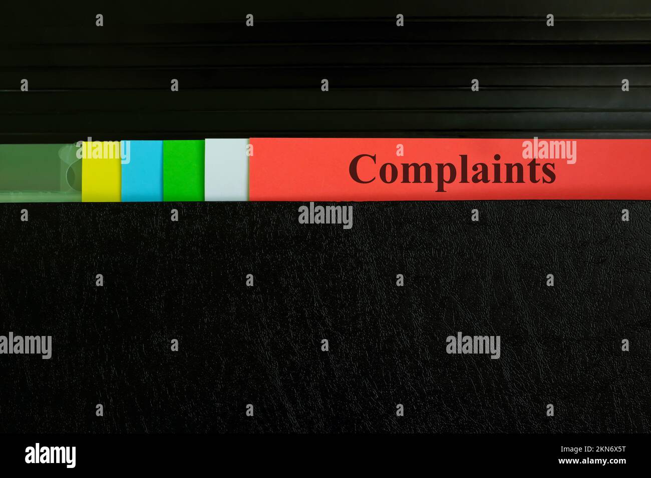 Complaints file record in black binder folder. Customer complaint ...
