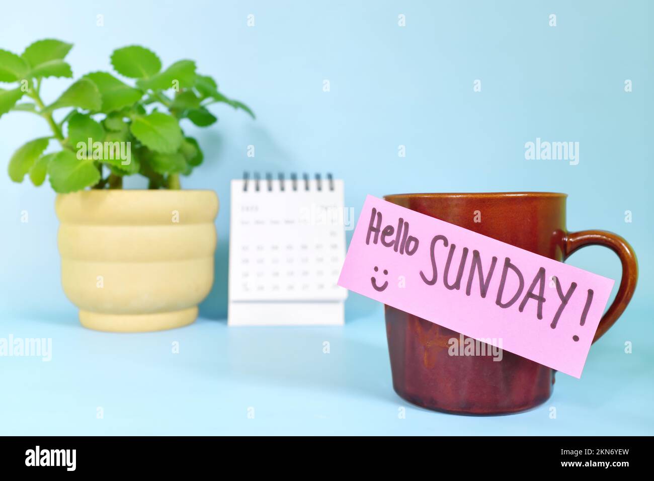 Welcome, hello and happy Sunday concept. Selective focus of coffee cup ...