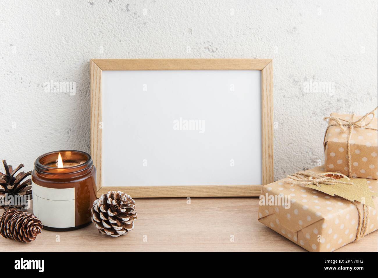 White blank wooden frame mockup with Christmas decorations on the ...