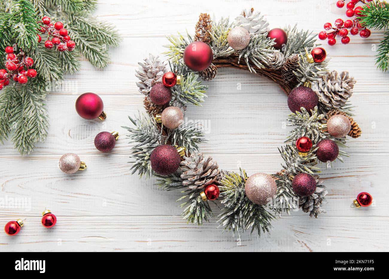 Decorative festive Christmas wreath. Wreath with red and golden ...