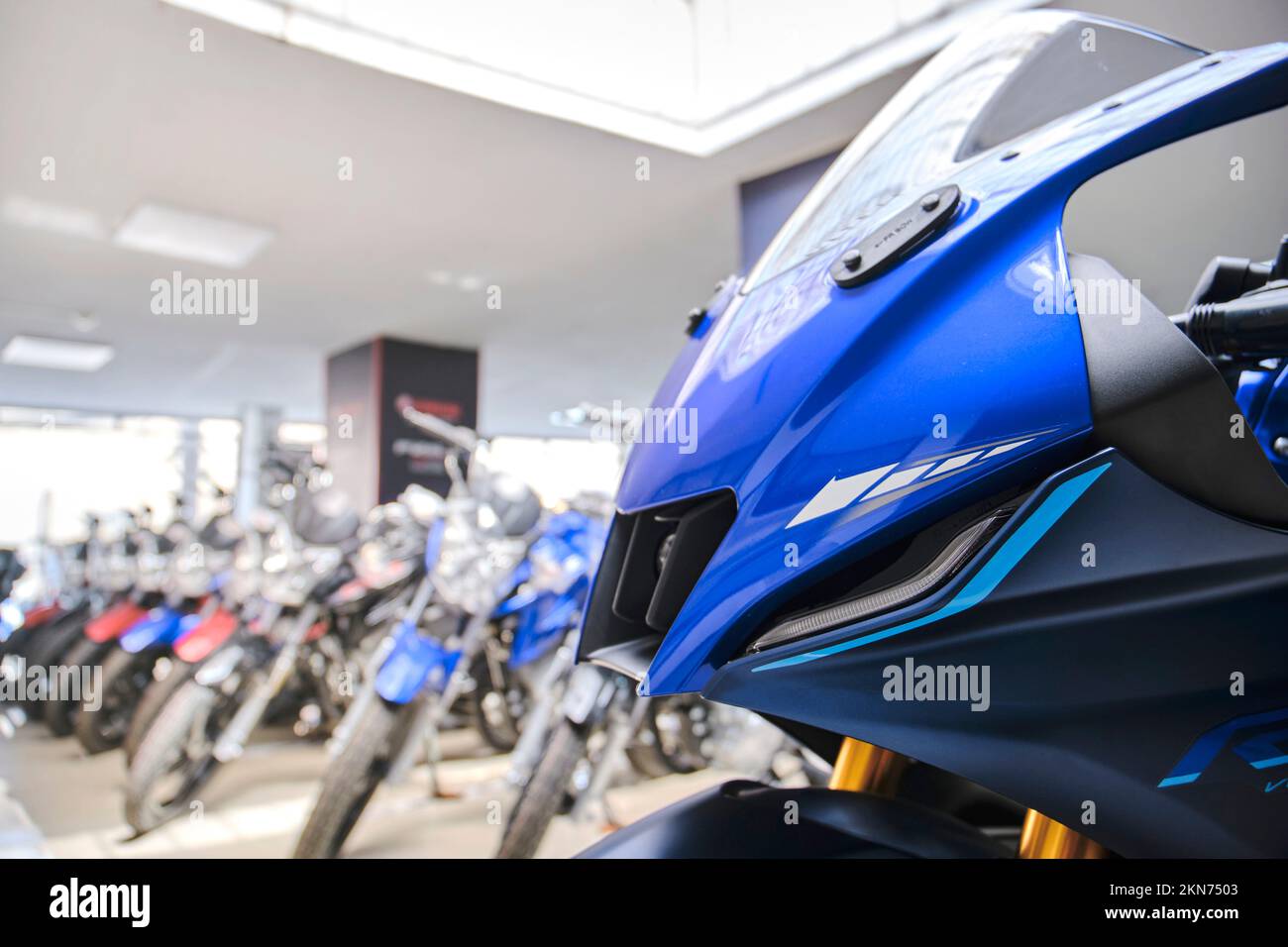 Motorcycles in the showroom Yamaha shop. Yamaha R15 v4 motorcycle ...
