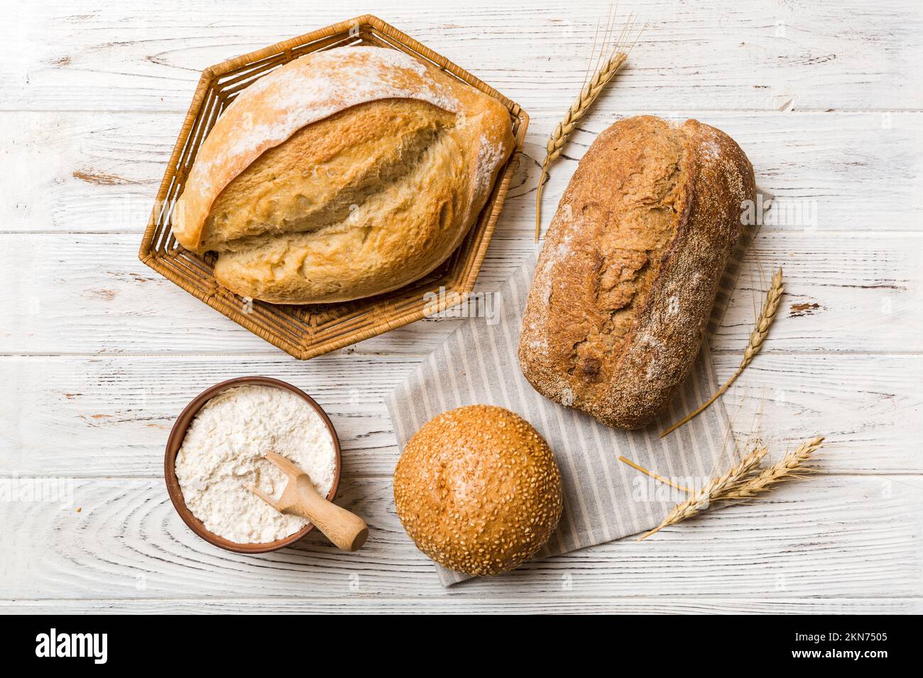 Freshly baked bread on basket against natural background. top view ...