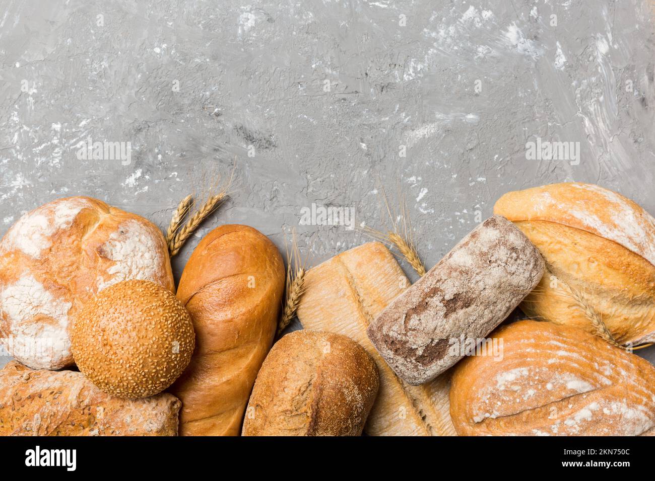 Homemade natural breads. Different kinds of fresh bread as background ...