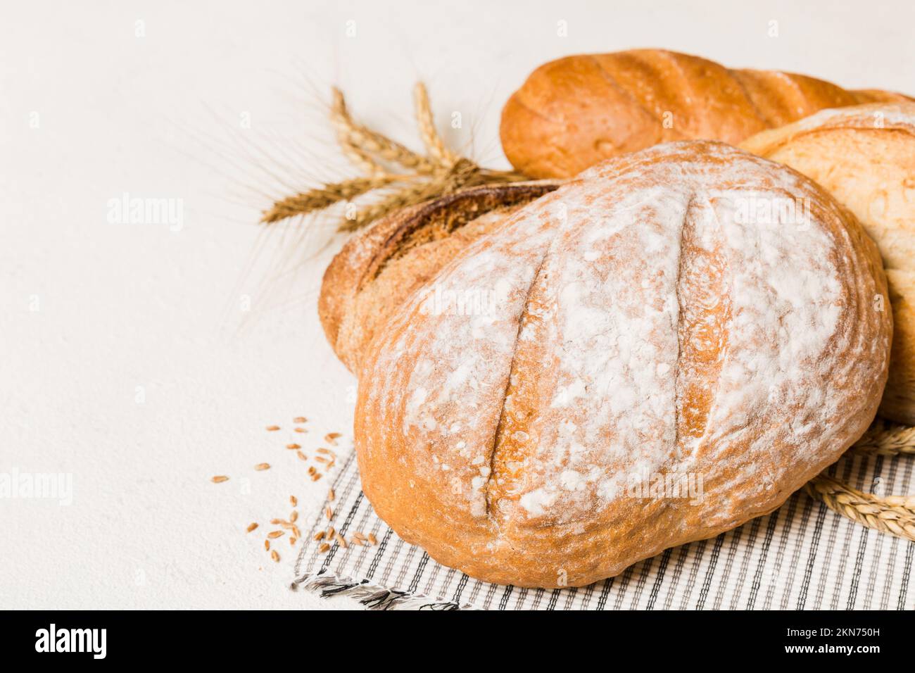 Homemade natural breads. Different kinds of fresh bread as background ...