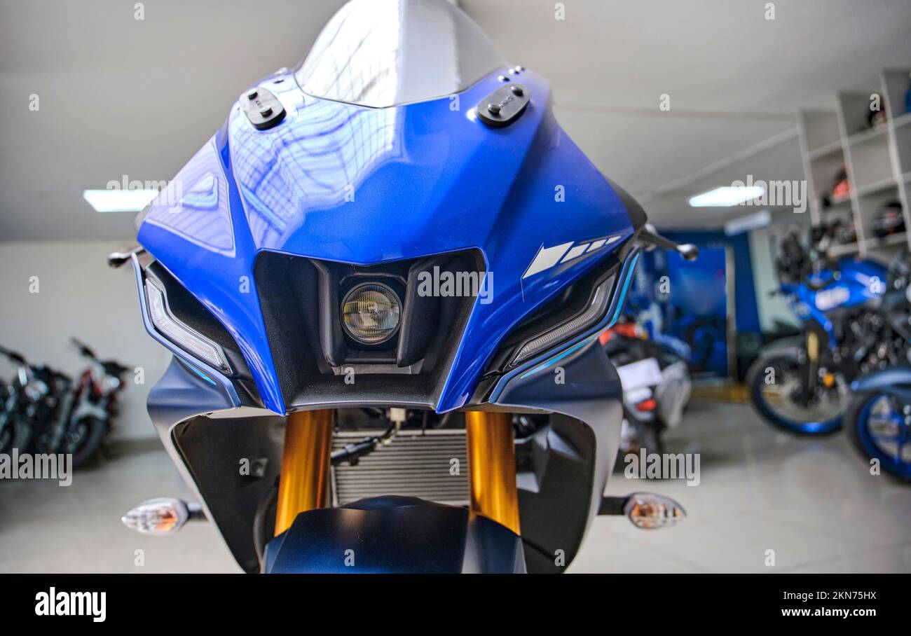 Motorcycles in the showroom Yamaha shop. Yamaha R15 v4 motorcycle ...