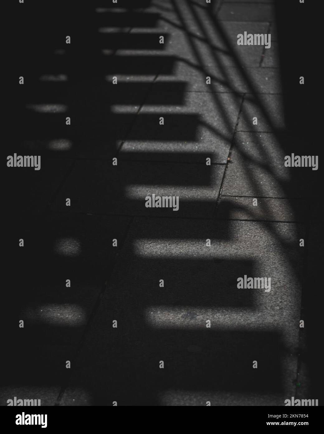 A vertical shot of the shadows of stairs on a floor Stock Photo - Alamy