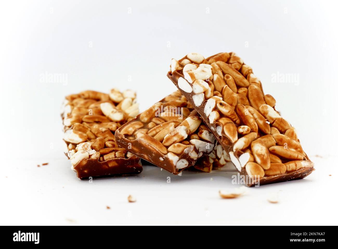 pieces of rice chocolate bar over white background Stock Photo - Alamy