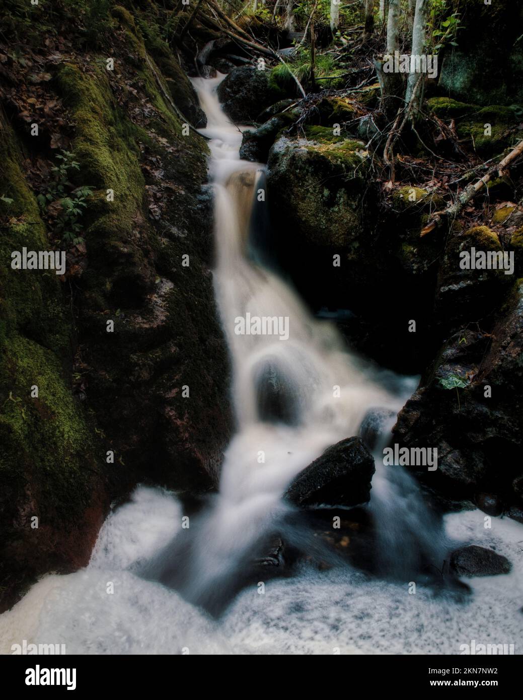 a vertical light exposure shot of a waterfall Stock Photo - Alamy