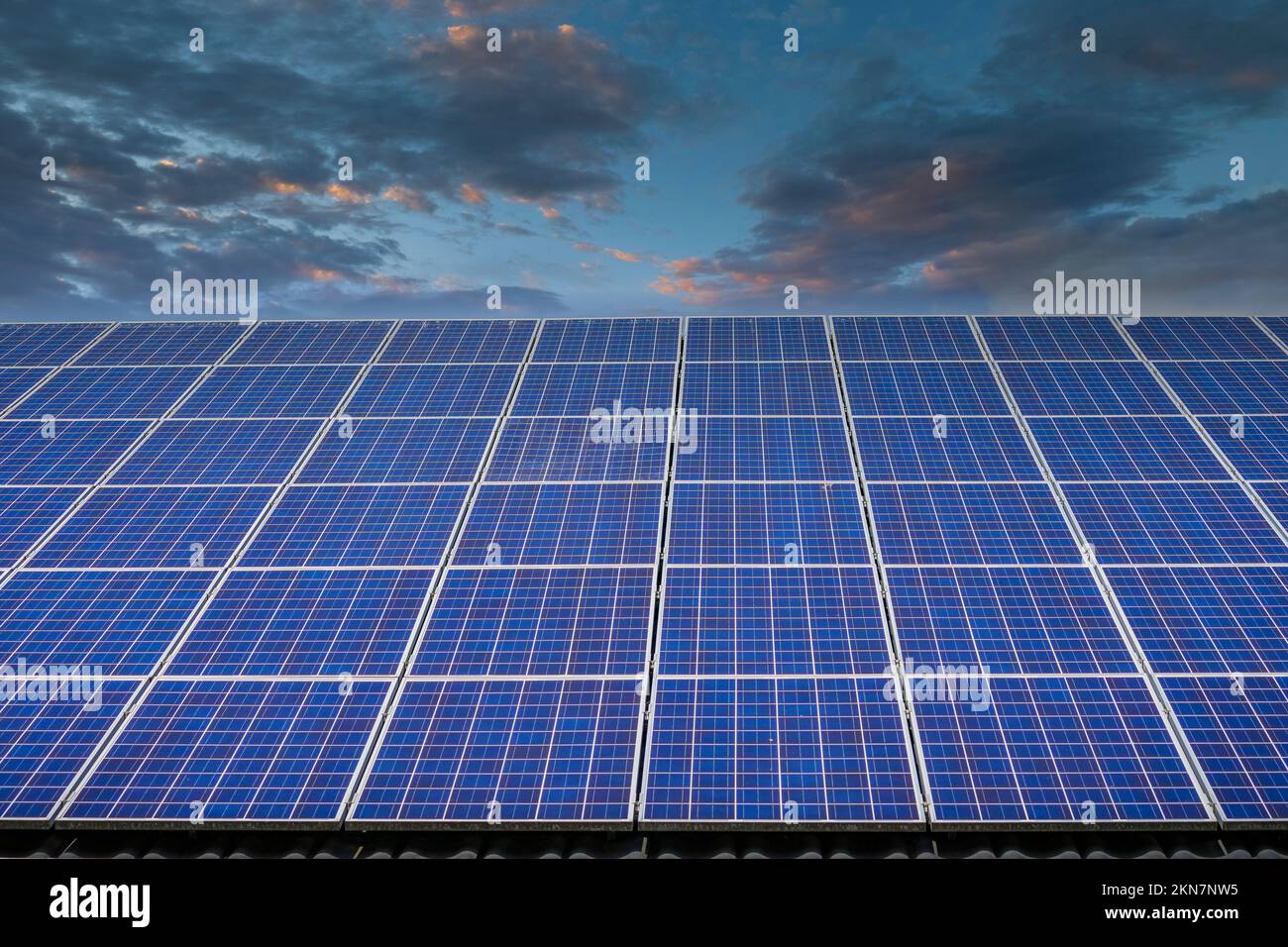 a Closeup shot of a house roof with solar power technologies Stock ...