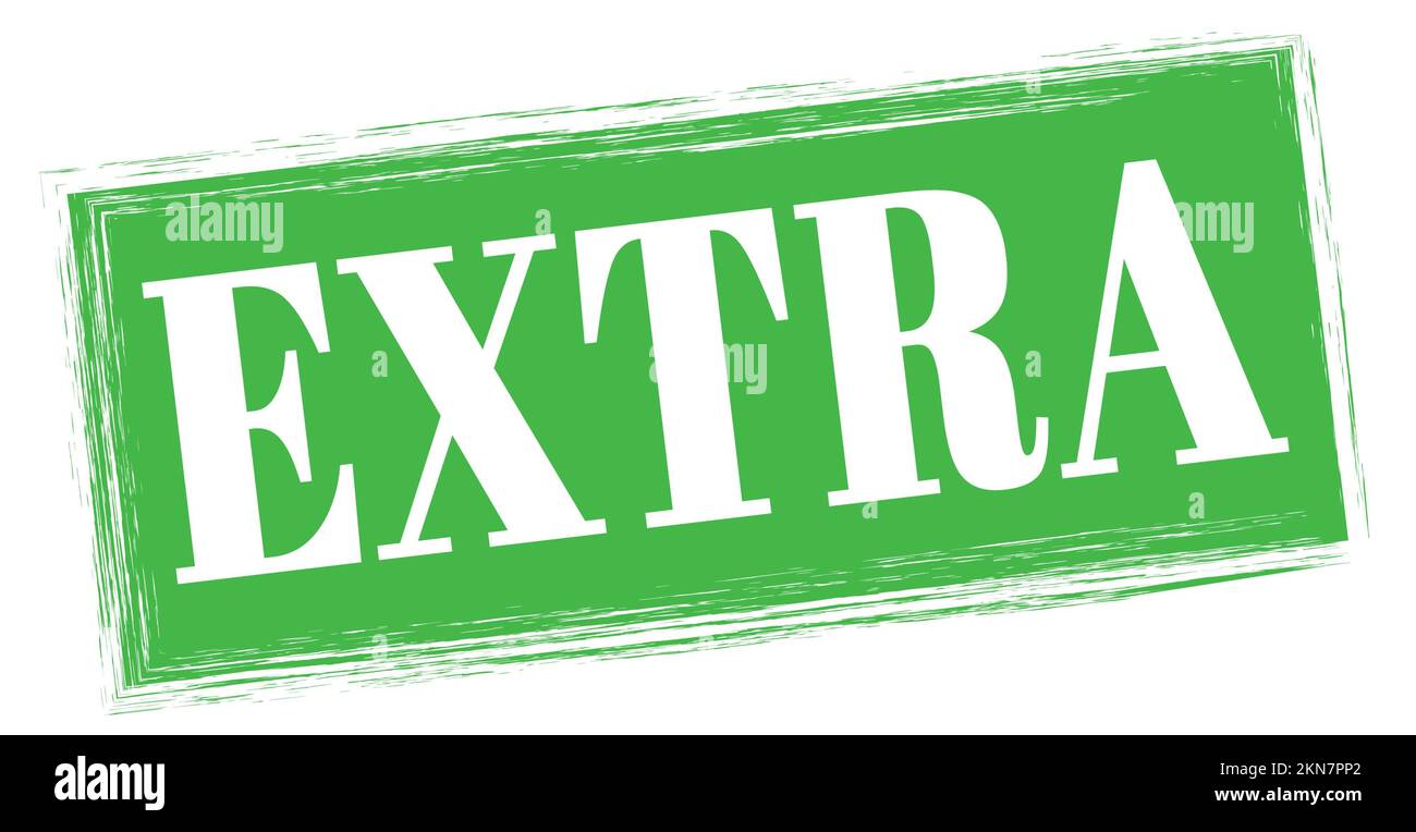EXTRA text written on green rectangle stamp sign Stock Photo - Alamy