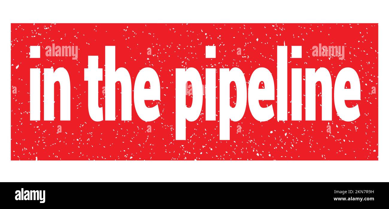 in the pipeline text written on red grungy stamp sign Stock Photo - Alamy