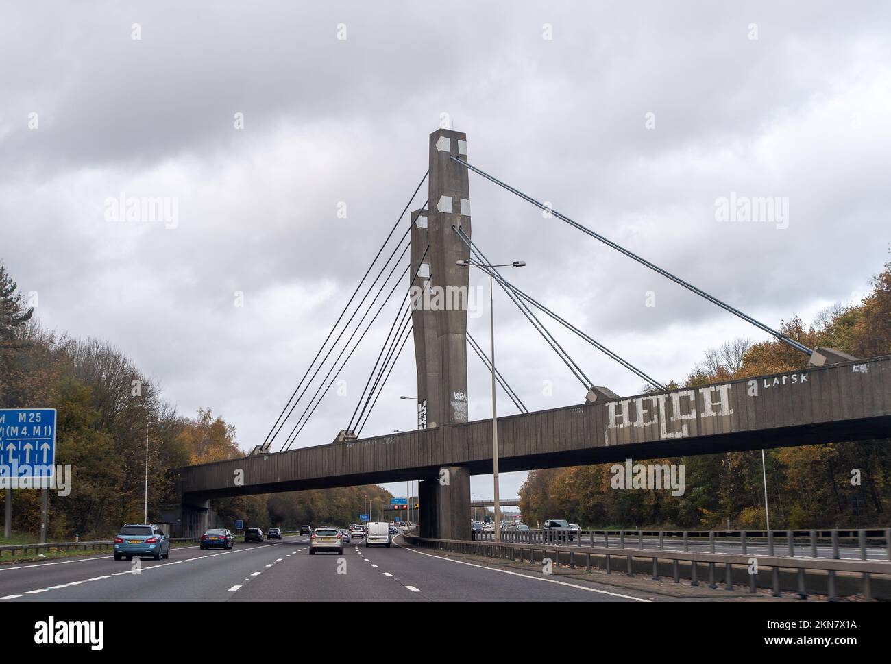 Thorpe, Surrey, UK. 26th November, 2022. Helch graffiti on a bridge on ...