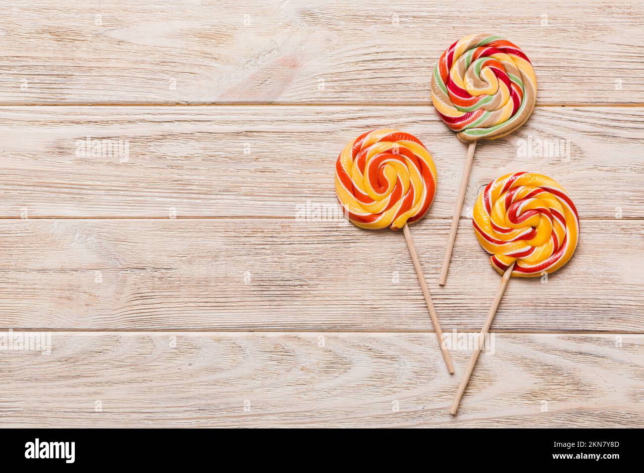 Set of colorful lollipops on colored background. Summer concept. Party ...