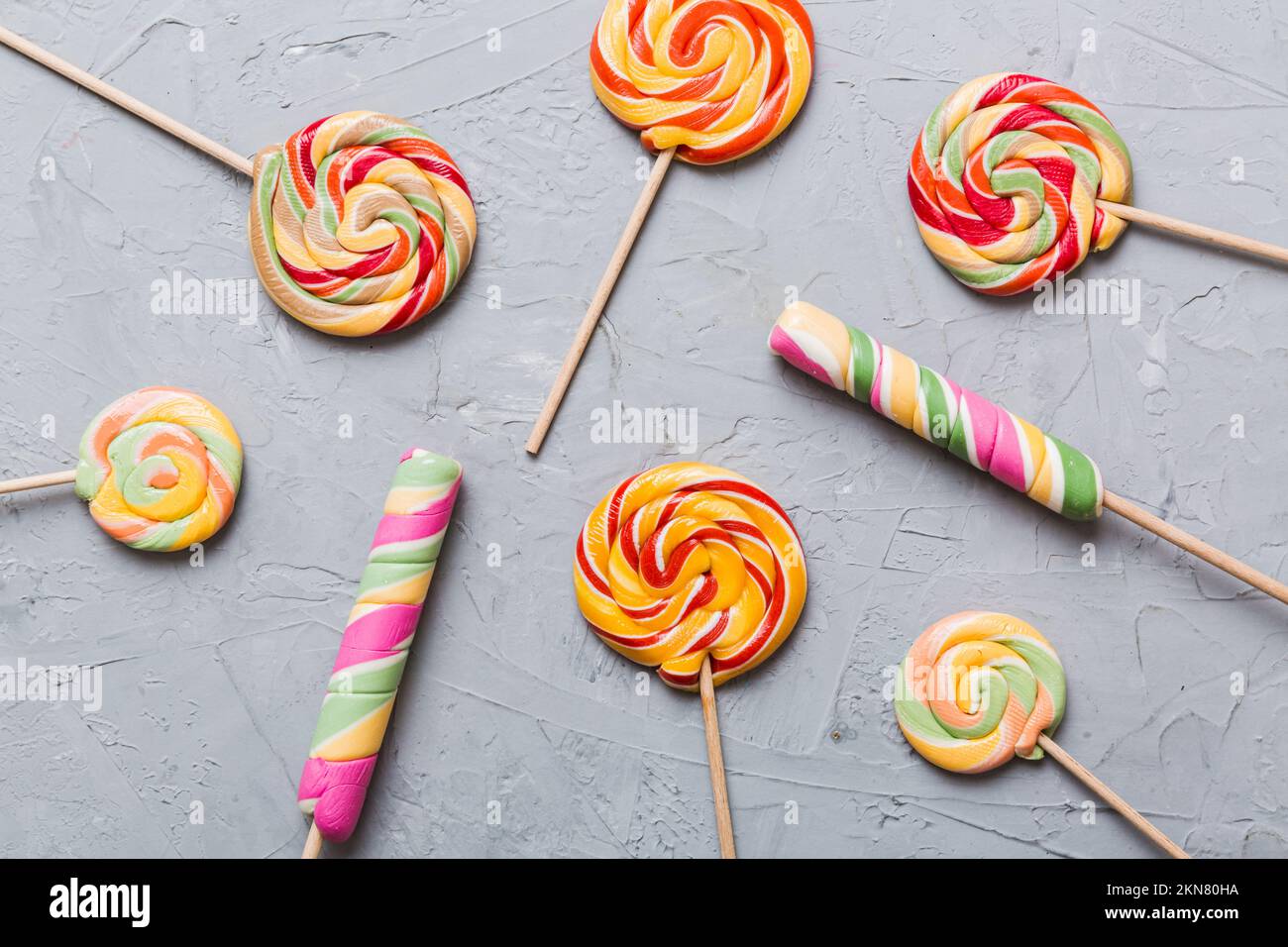 Set of colorful lollipops on colored background. Summer concept. Party ...