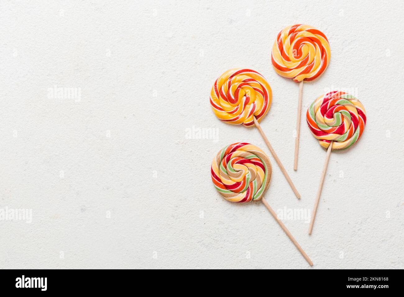 Set of colorful lollipops on colored background. Summer concept. Party ...