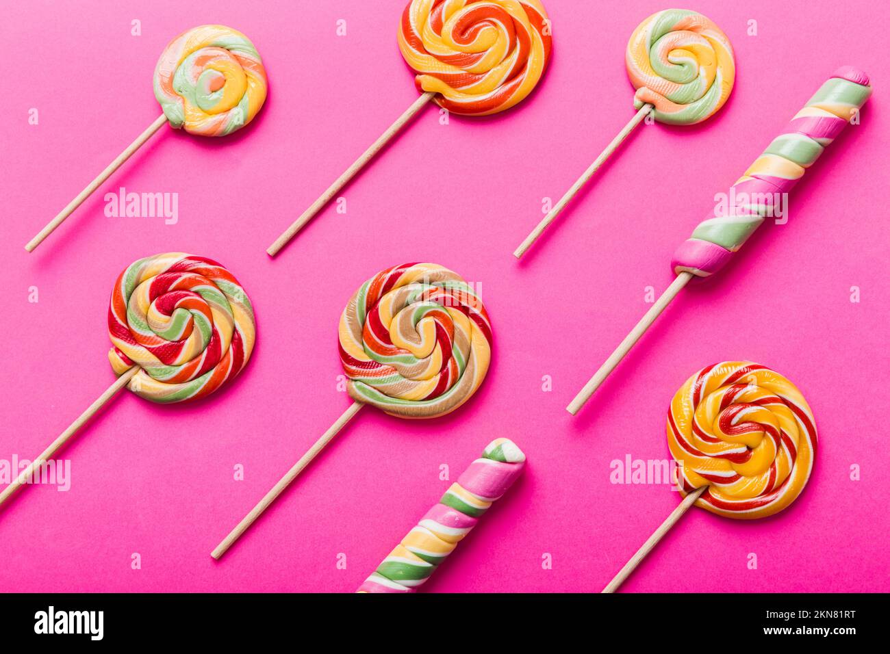 Set of colorful lollipops on colored background. Summer concept. Party ...
