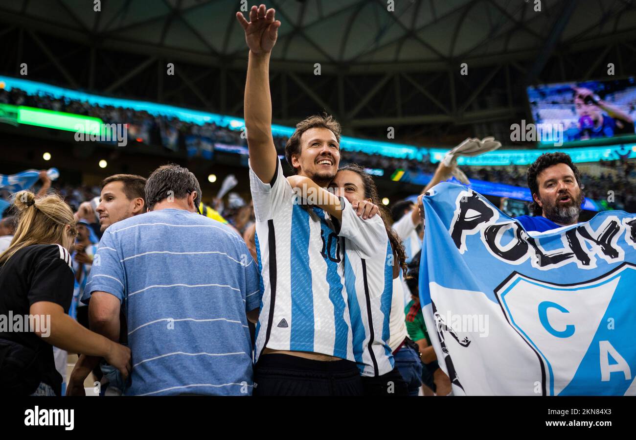 Doha, Qatar. 26th Nov, 2022. Argentine fans celebrate long after the ...
