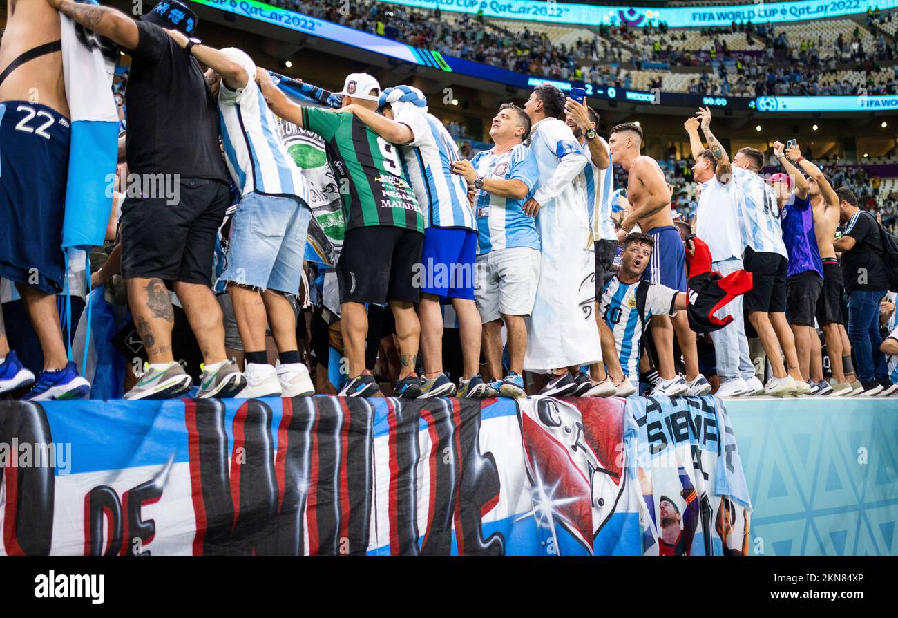 Doha, Qatar. 26th Nov, 2022. Argentine fans celebrate long after the ...